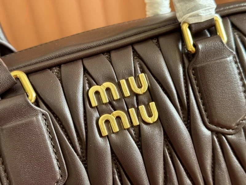 Value-priced Miu Miu Top Handle Bags