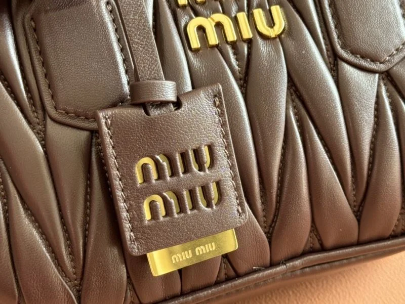 Value-priced Miu Miu Top Handle Bags