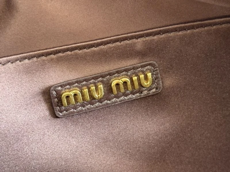 Value-priced Miu Miu Top Handle Bags