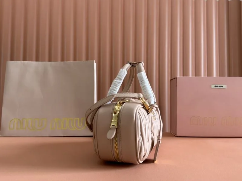 Indistinguishable Miu Miu Top Handle Bags
