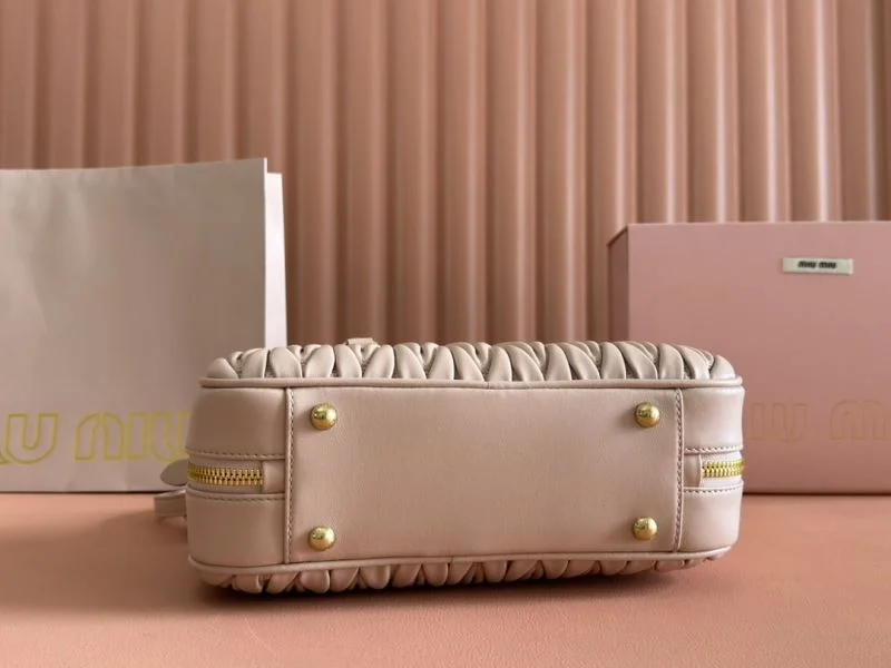 Indistinguishable Miu Miu Top Handle Bags