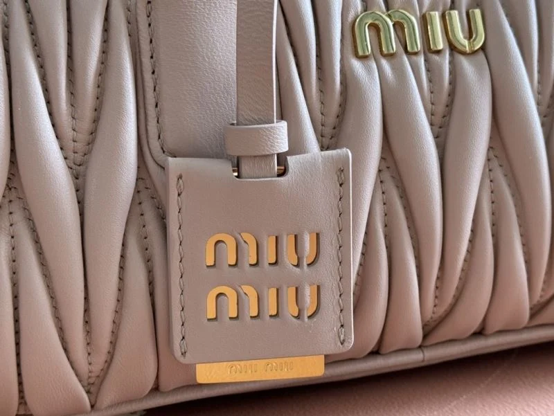 Indistinguishable Miu Miu Top Handle Bags