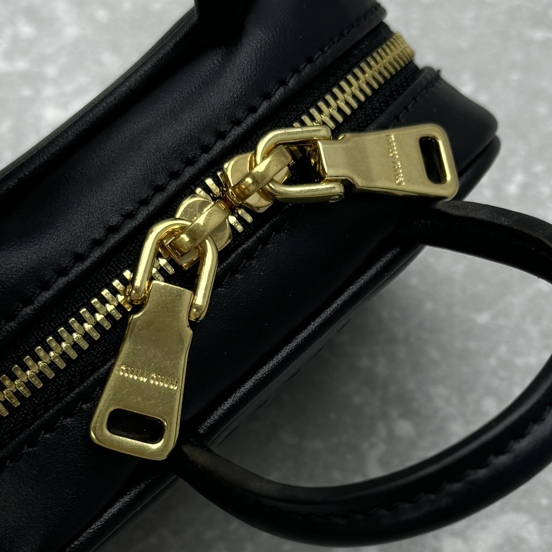 Brand-authenticated Miu Miu Top Handle Bags