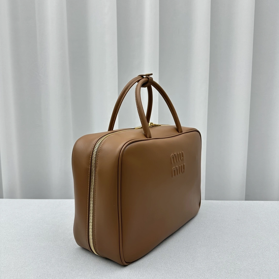 Indistinguishable Miu Miu Top Handle Bags