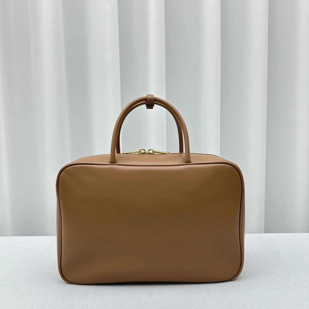 Indistinguishable Miu Miu Top Handle Bags