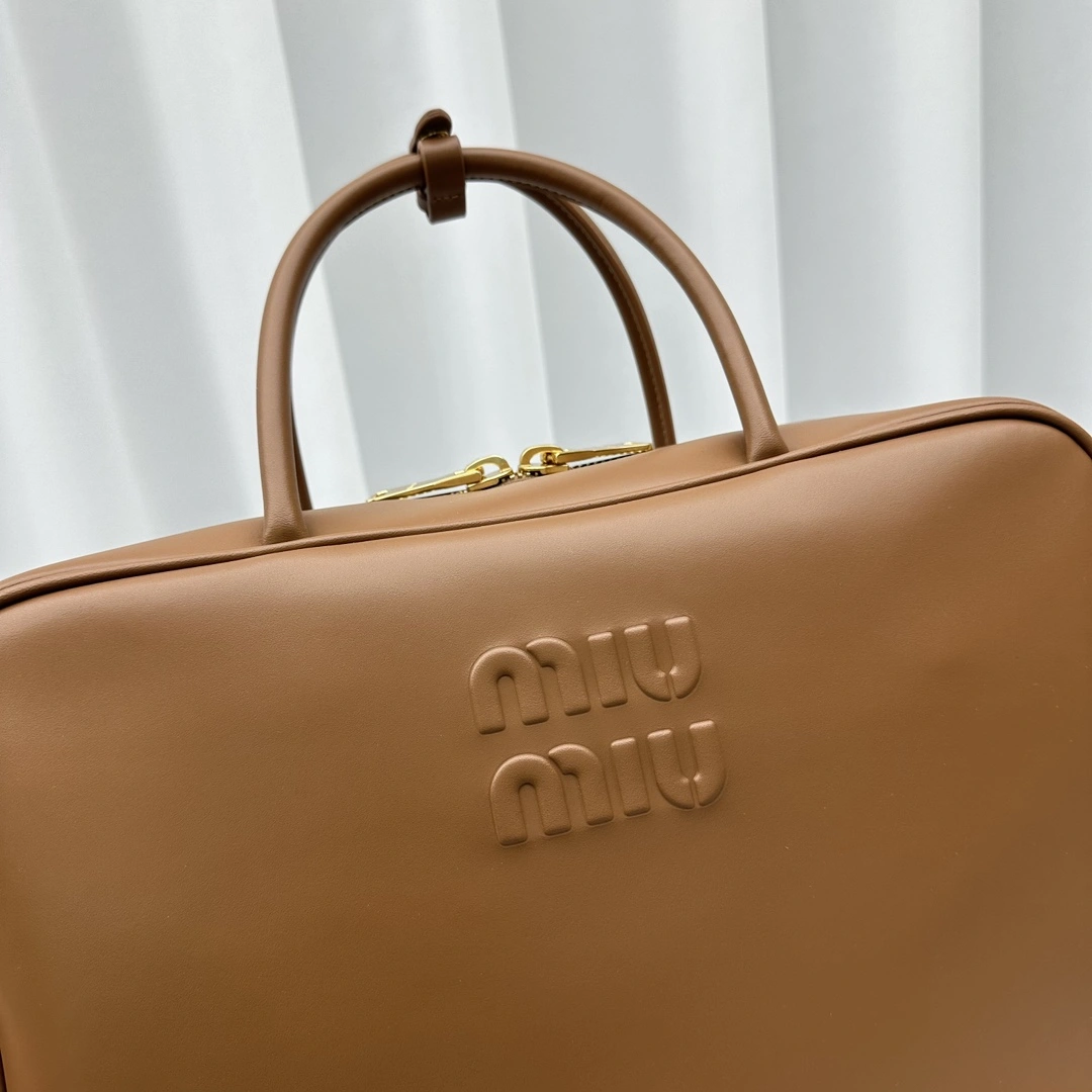 Indistinguishable Miu Miu Top Handle Bags