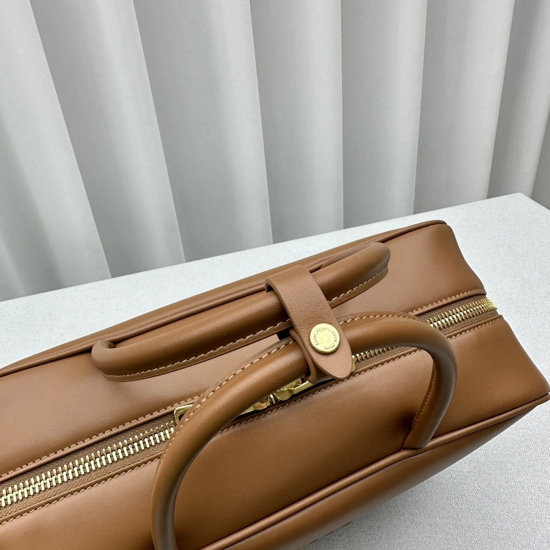 Indistinguishable Miu Miu Top Handle Bags