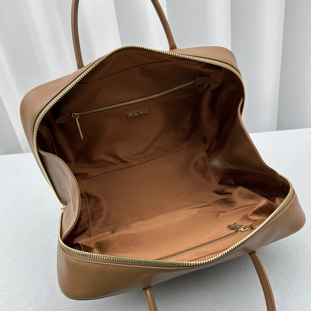 Indistinguishable Miu Miu Top Handle Bags