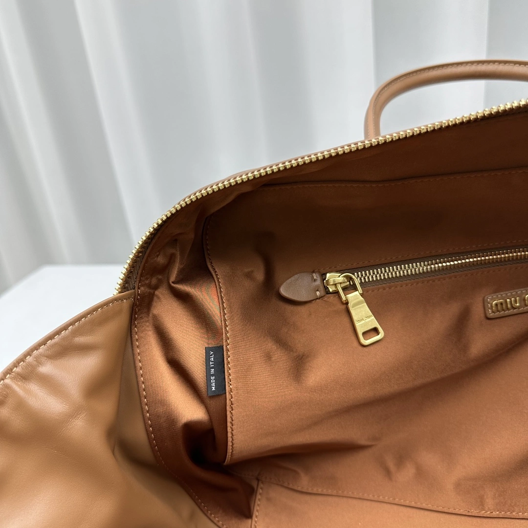 Indistinguishable Miu Miu Top Handle Bags
