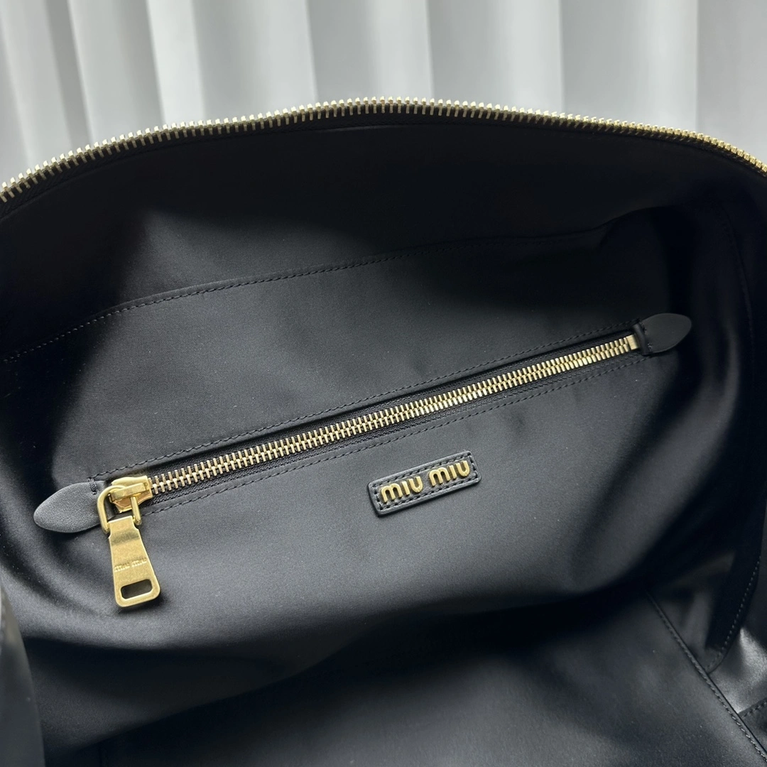 Budget-friendly Miu Miu Top Handle Bags