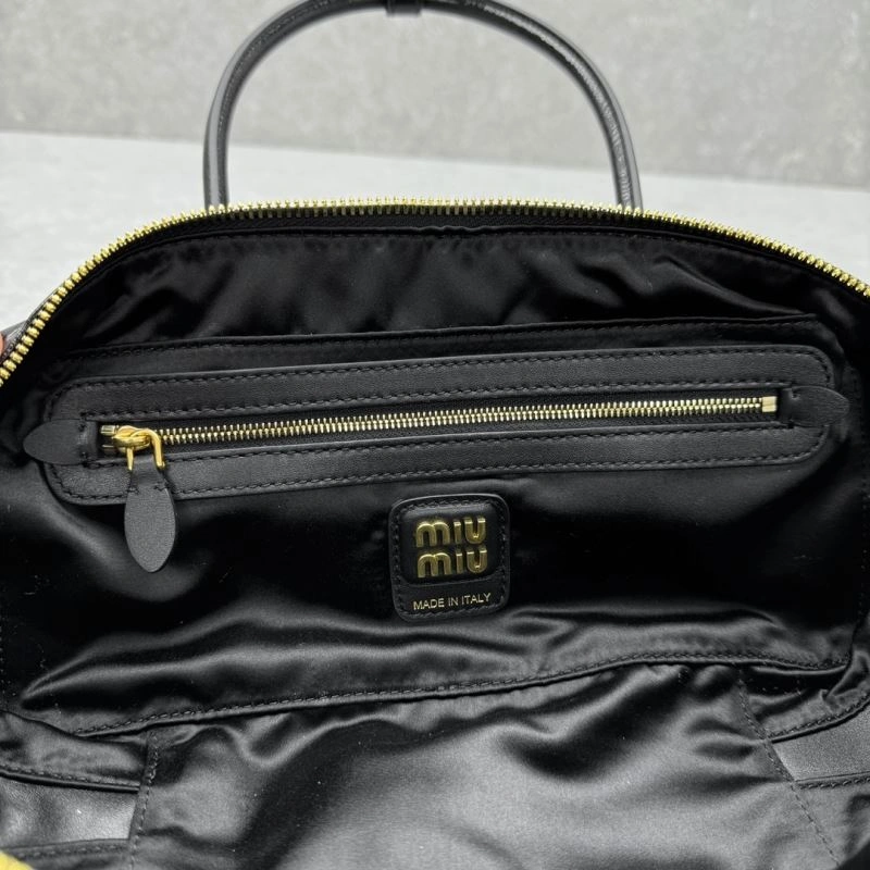 Indistinguishable Miu Miu Top Handle Bags