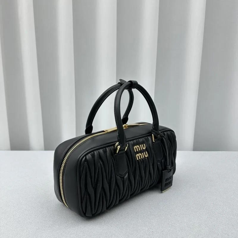 Indistinguishable Miu Miu Top Handle Bags