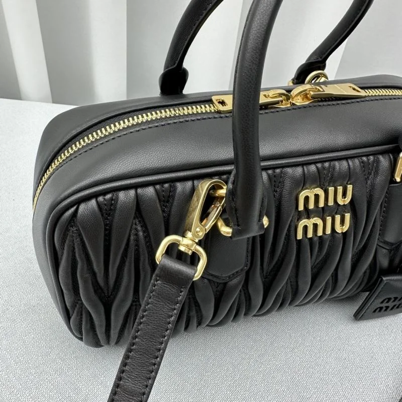 Indistinguishable Miu Miu Top Handle Bags