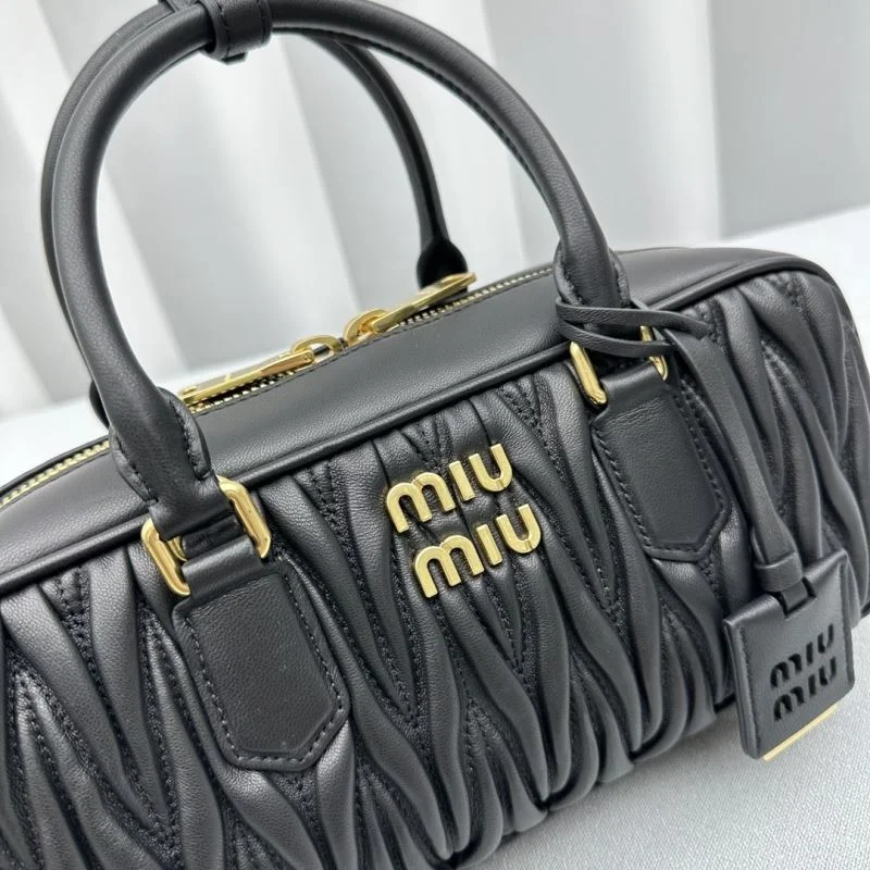 Indistinguishable Miu Miu Top Handle Bags
