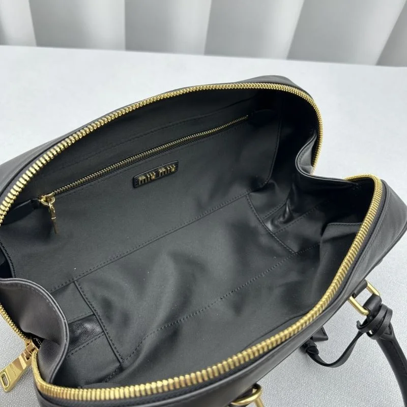 Indistinguishable Miu Miu Top Handle Bags