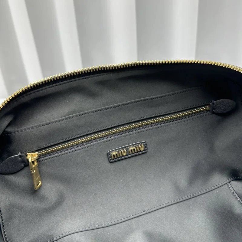 Indistinguishable Miu Miu Top Handle Bags