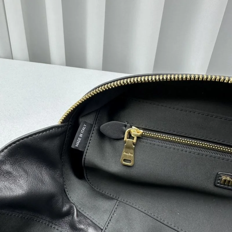 Indistinguishable Miu Miu Top Handle Bags
