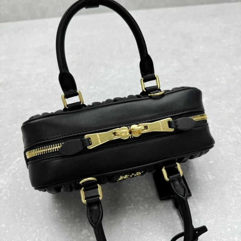 Brand-authenticated Miu Miu Top Handle Bags