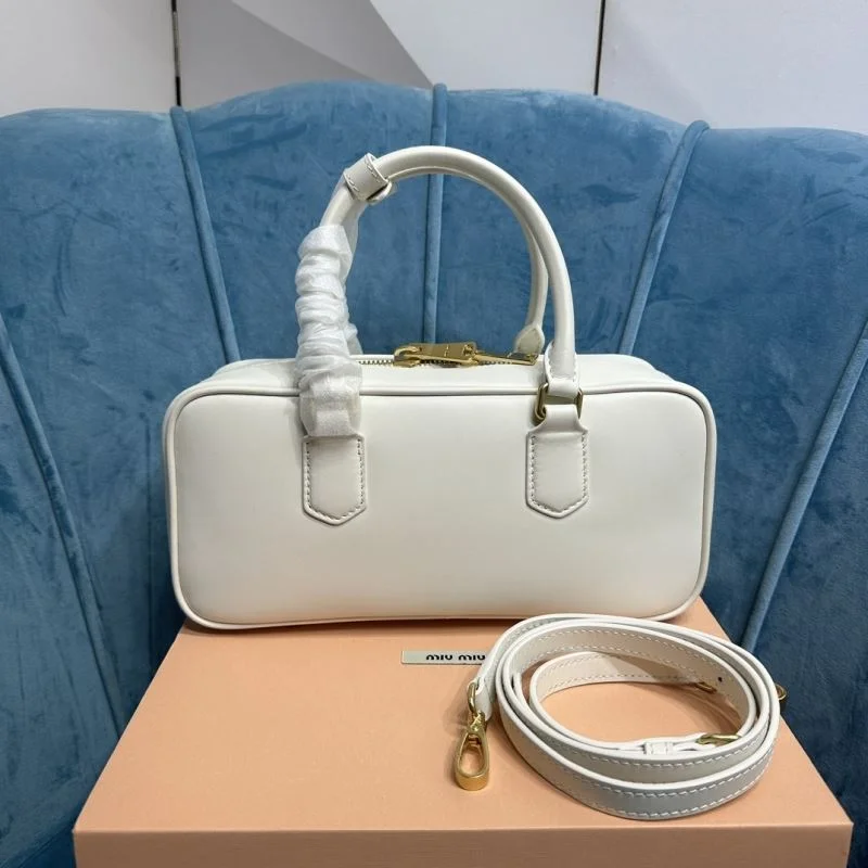 Indistinguishable Miu Miu Top Handle Bags