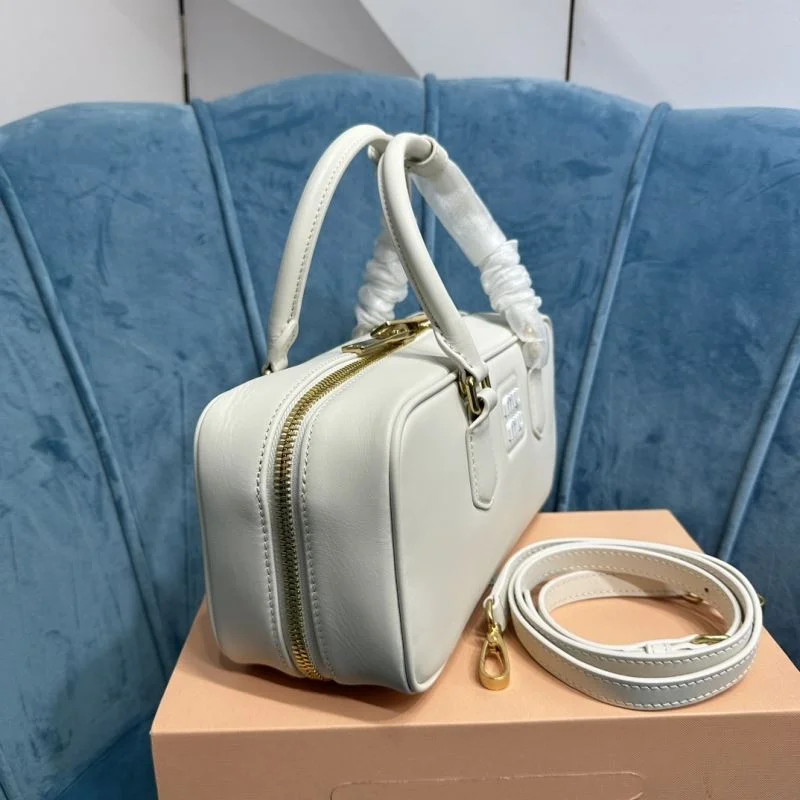 Indistinguishable Miu Miu Top Handle Bags