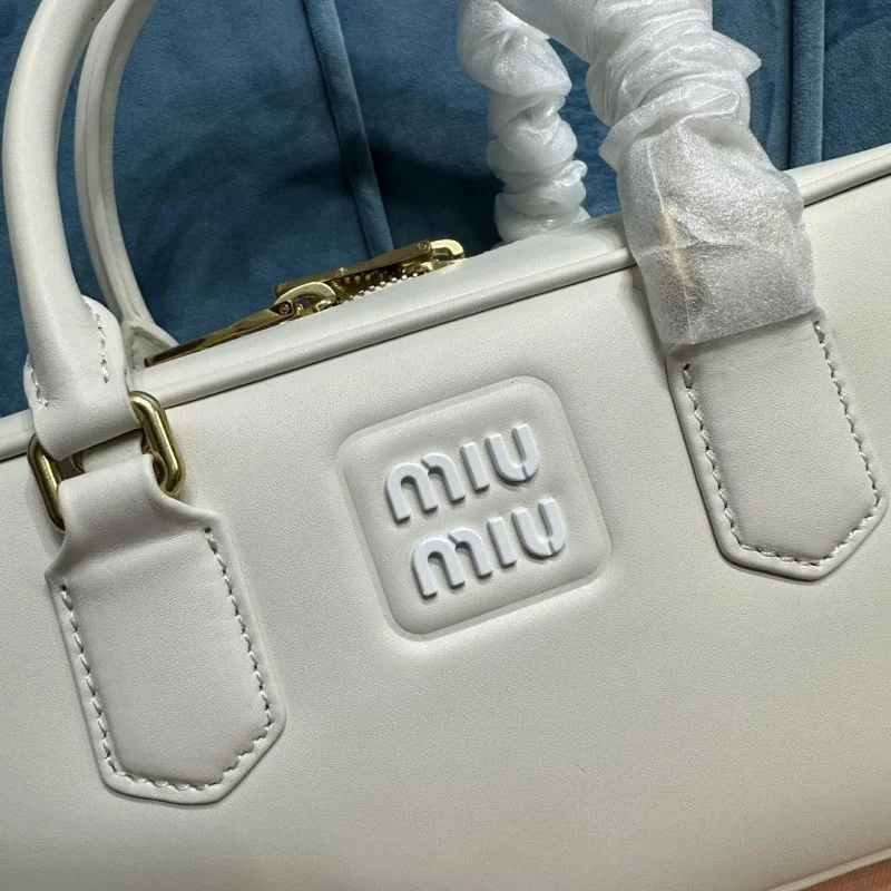 Indistinguishable Miu Miu Top Handle Bags