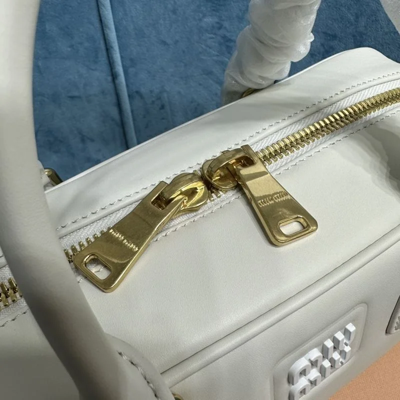 Indistinguishable Miu Miu Top Handle Bags