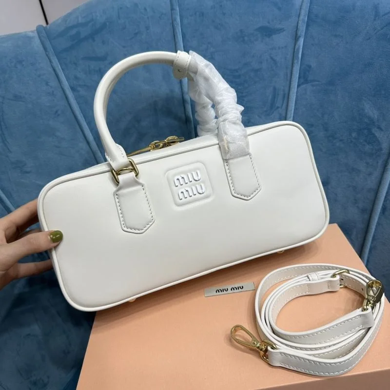 Indistinguishable Miu Miu Top Handle Bags