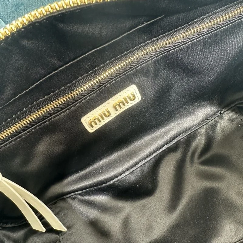 Indistinguishable Miu Miu Top Handle Bags