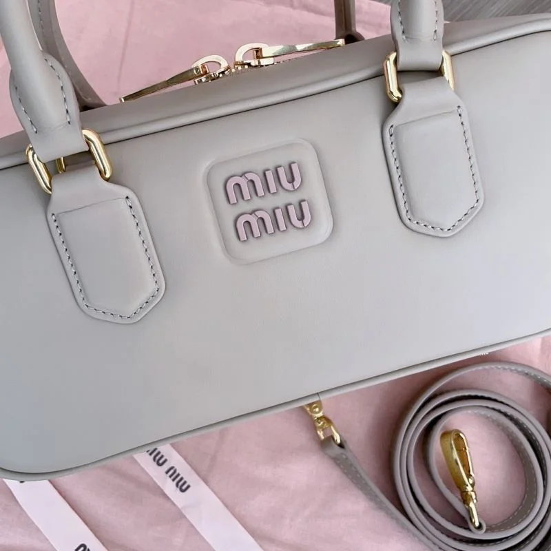 Value-priced Miu Miu Top Handle Bags
