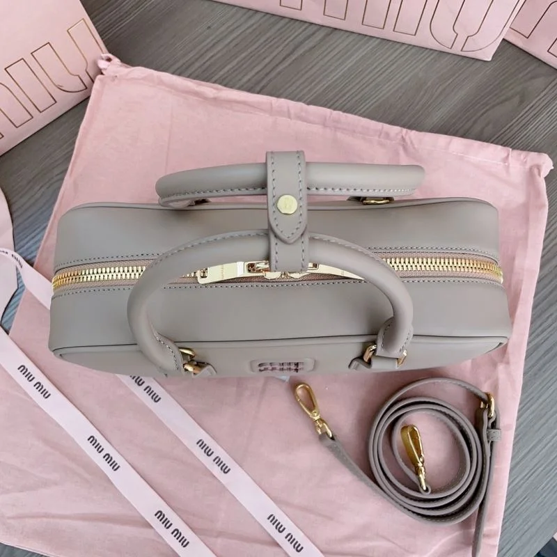 Value-priced Miu Miu Top Handle Bags