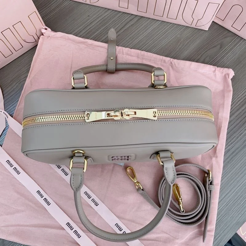 Value-priced Miu Miu Top Handle Bags
