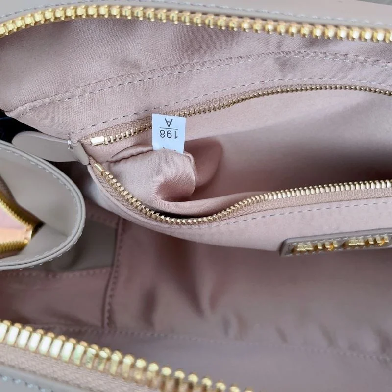 Value-priced Miu Miu Top Handle Bags