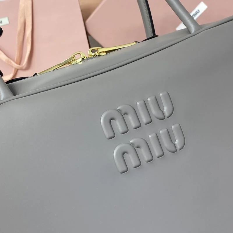 Top mirror Miu Miu Top Handle Bags