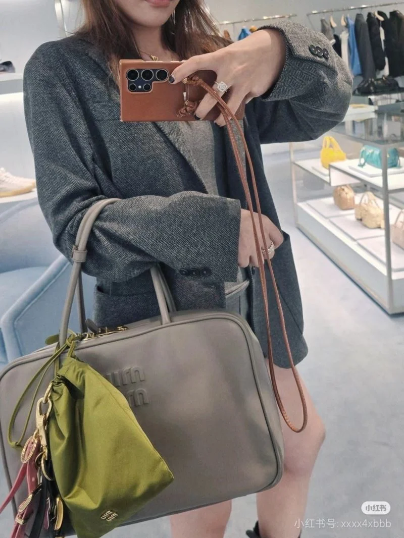 Top mirror Miu Miu Top Handle Bags