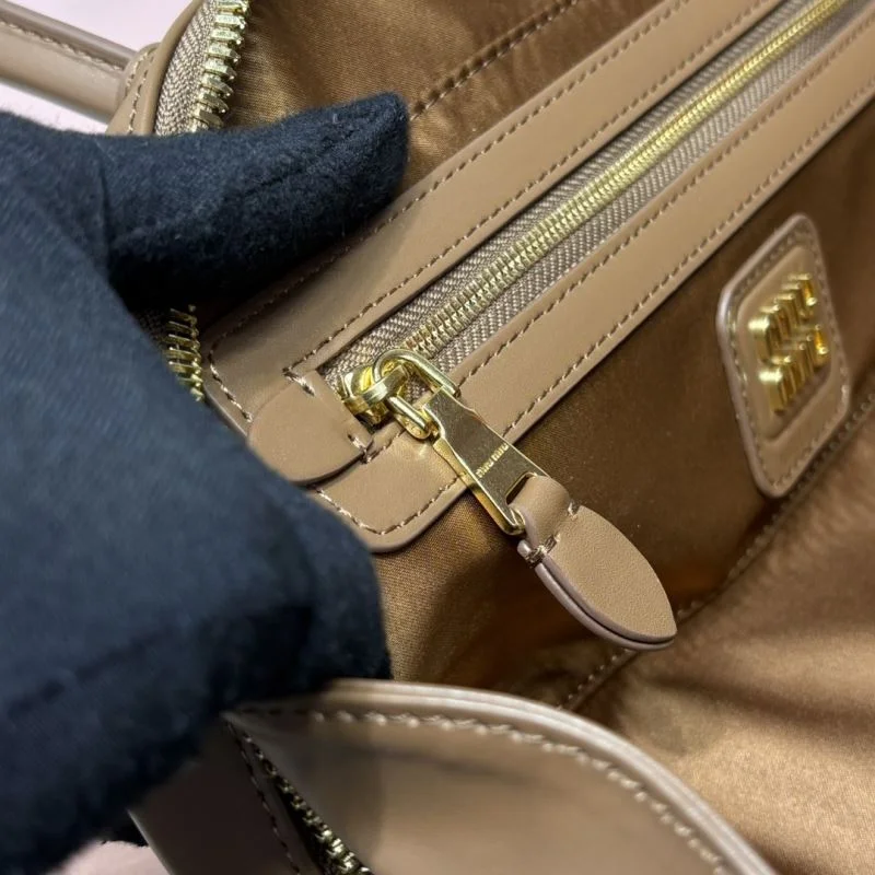 Brand-authenticated Miu Miu Top Handle Bags