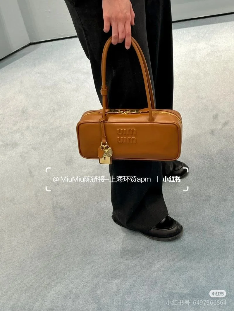 Brand-authenticated Miu Miu Top Handle Bags