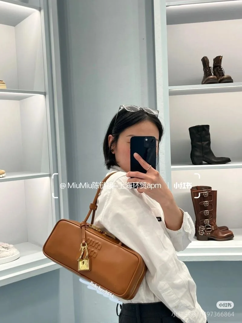 Brand-authenticated Miu Miu Top Handle Bags