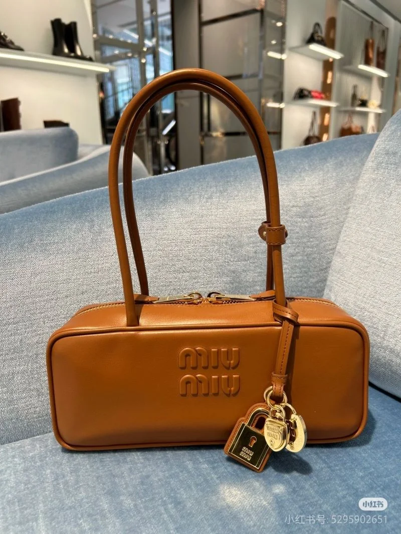 Brand-authenticated Miu Miu Top Handle Bags