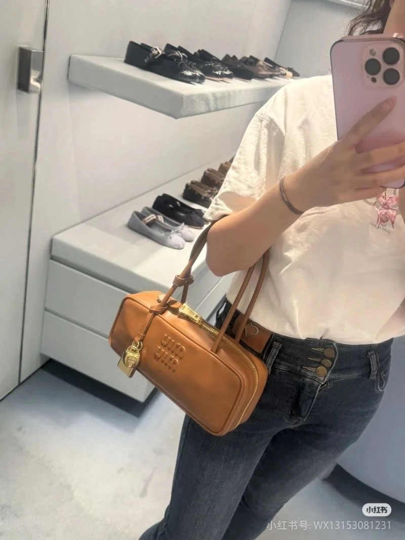 Brand-authenticated Miu Miu Top Handle Bags