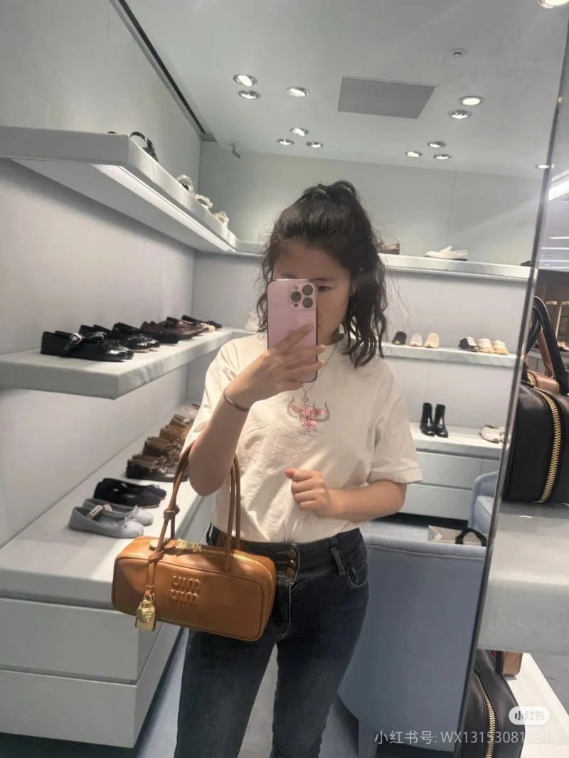 Brand-authenticated Miu Miu Top Handle Bags