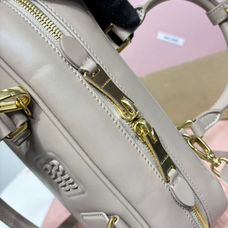 Value-priced Miu Miu Top Handle Bags