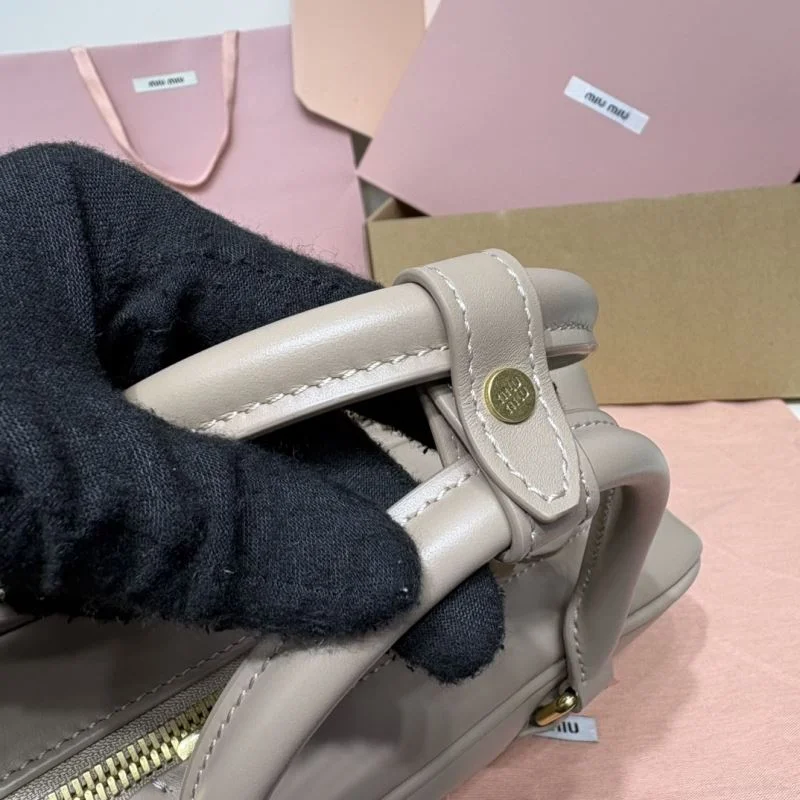 Value-priced Miu Miu Top Handle Bags