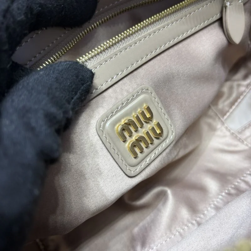 Value-priced Miu Miu Top Handle Bags