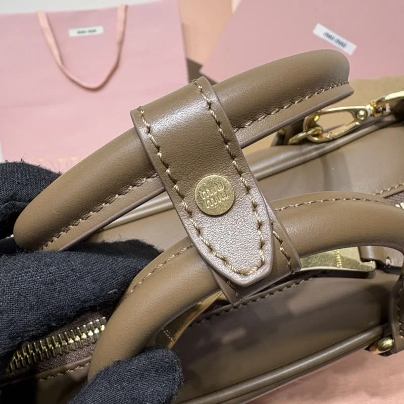 Top mirror Miu Miu Top Handle Bags