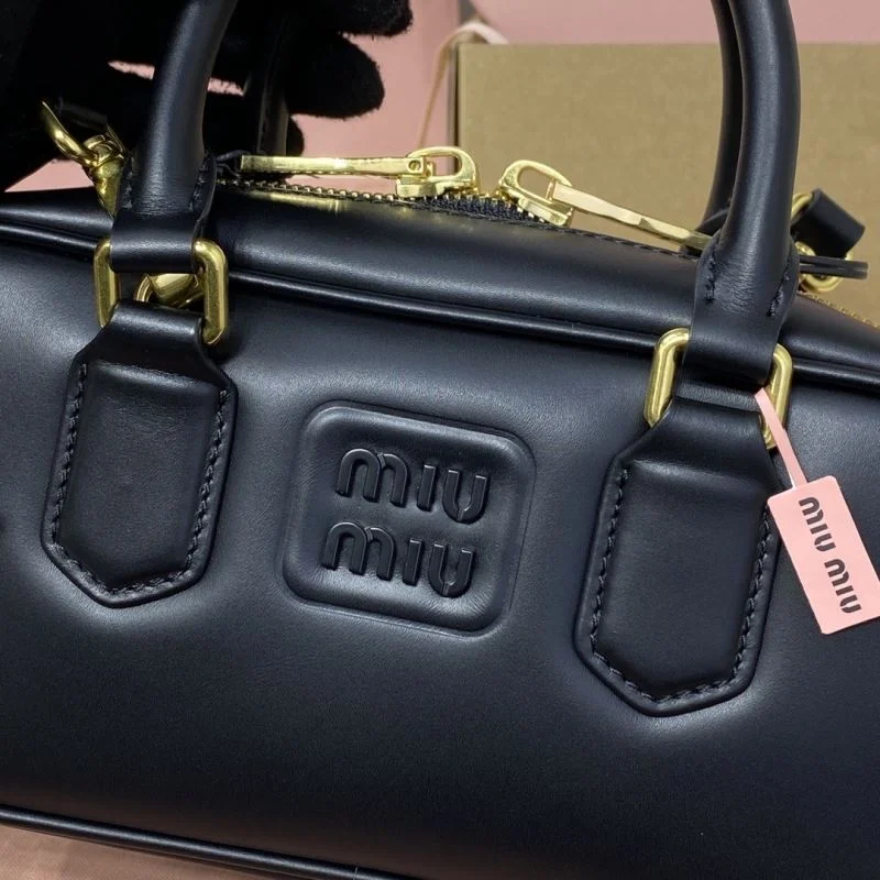 Top mirror Miu Miu Top Handle Bags