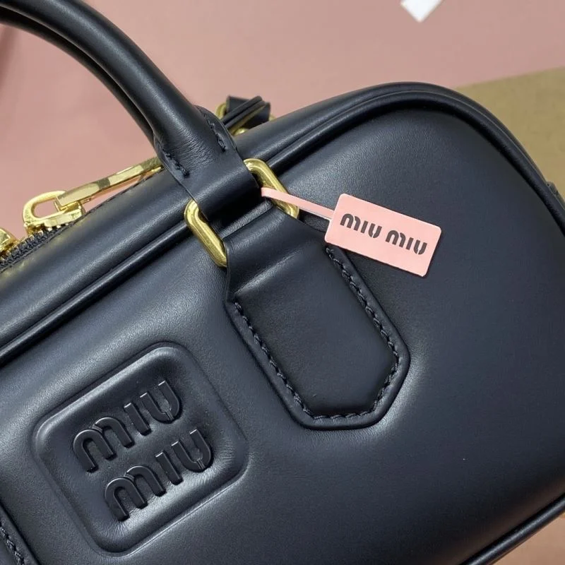 Top mirror Miu Miu Top Handle Bags