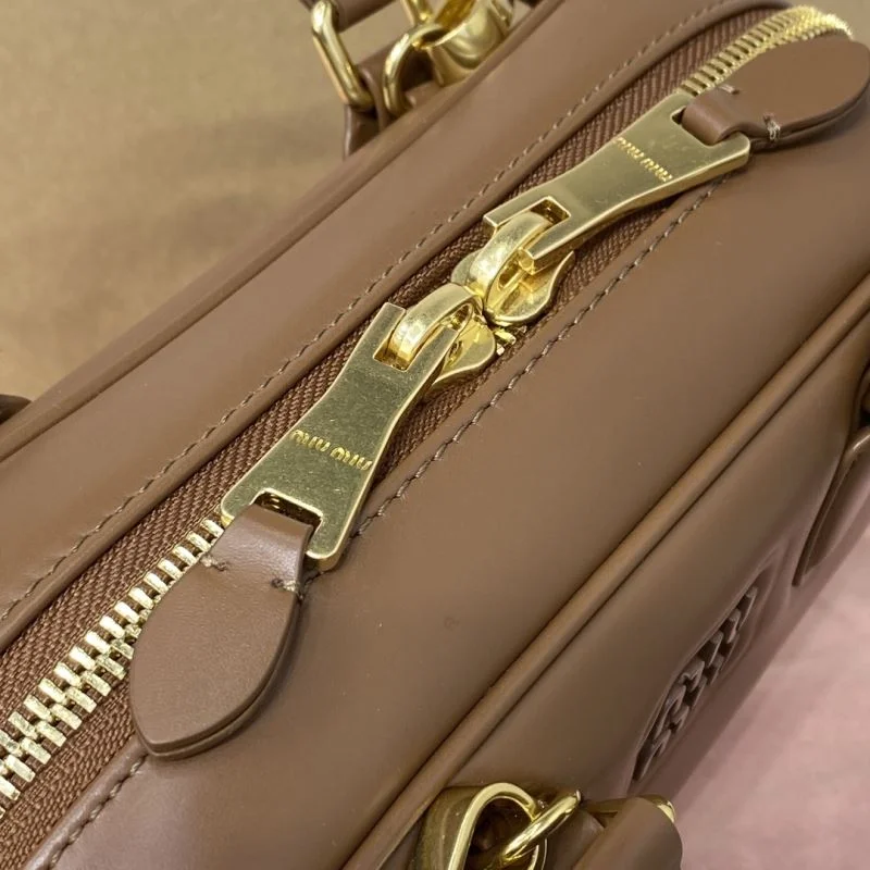 Value-priced Miu Miu Top Handle Bags