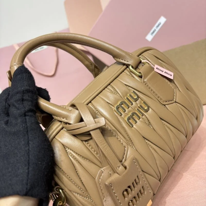 Value-priced Miu Miu Top Handle Bags