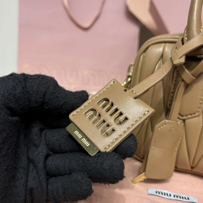 Value-priced Miu Miu Top Handle Bags