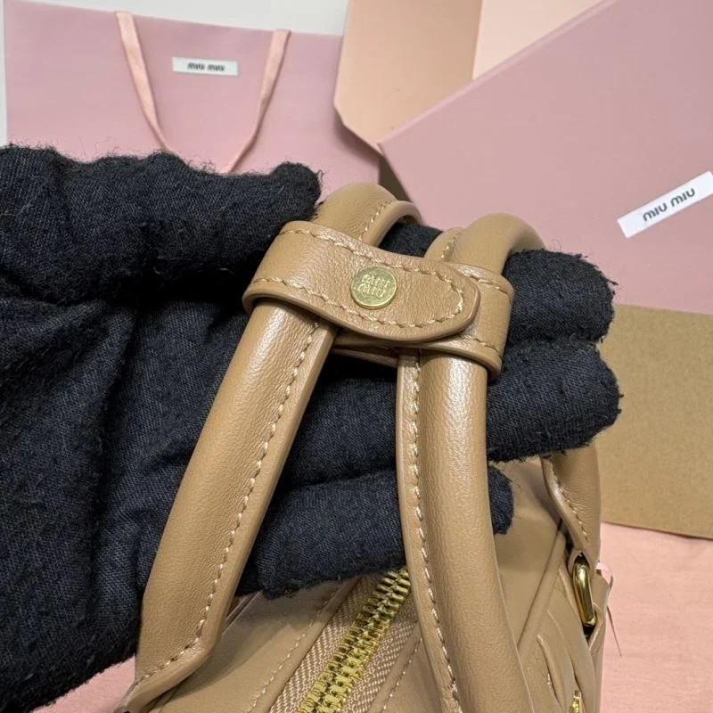 Value-priced Miu Miu Top Handle Bags